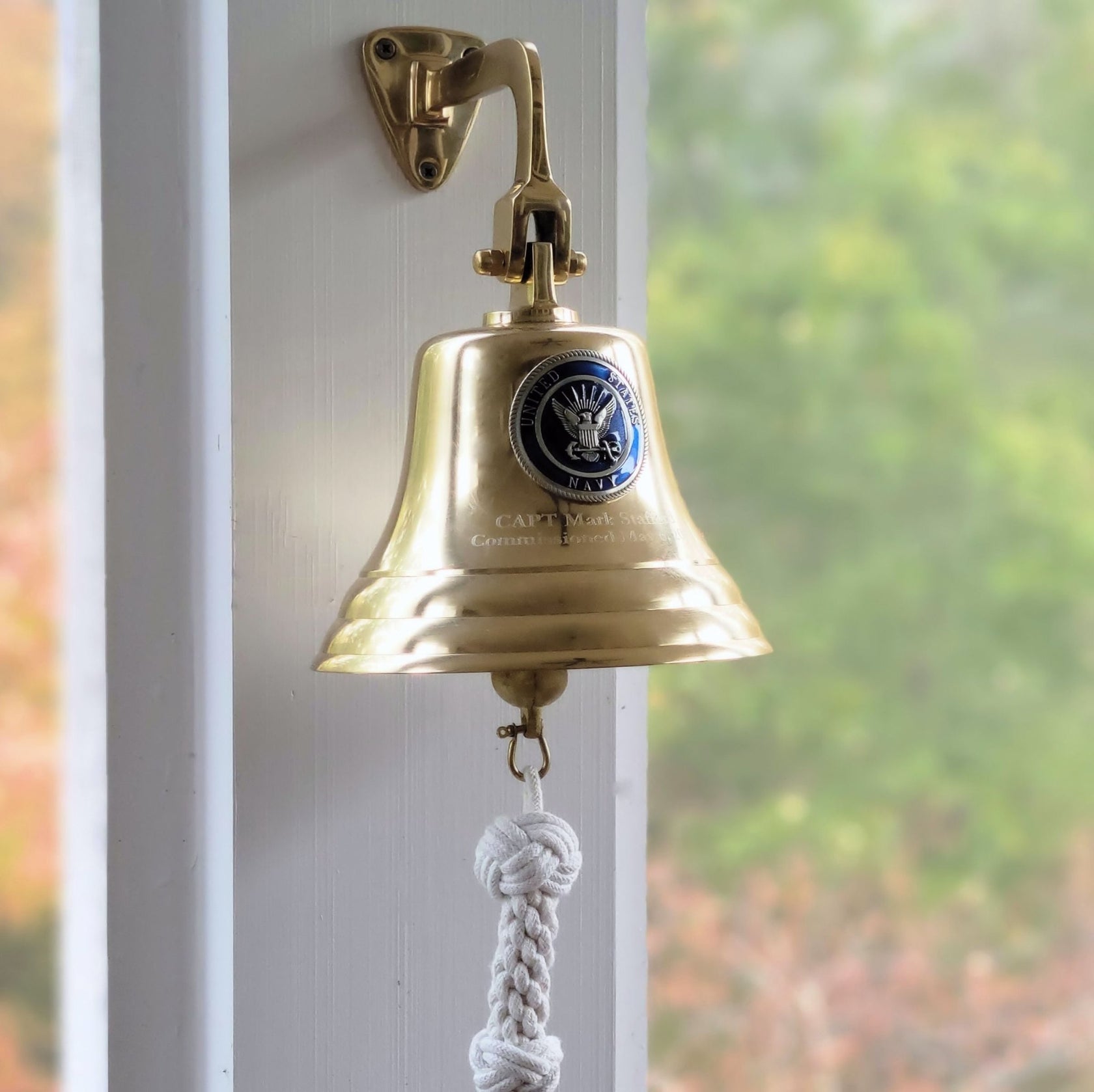 7 Inch Diameter Polished Brass Wall Bell With Navy Emblem – BrassBell